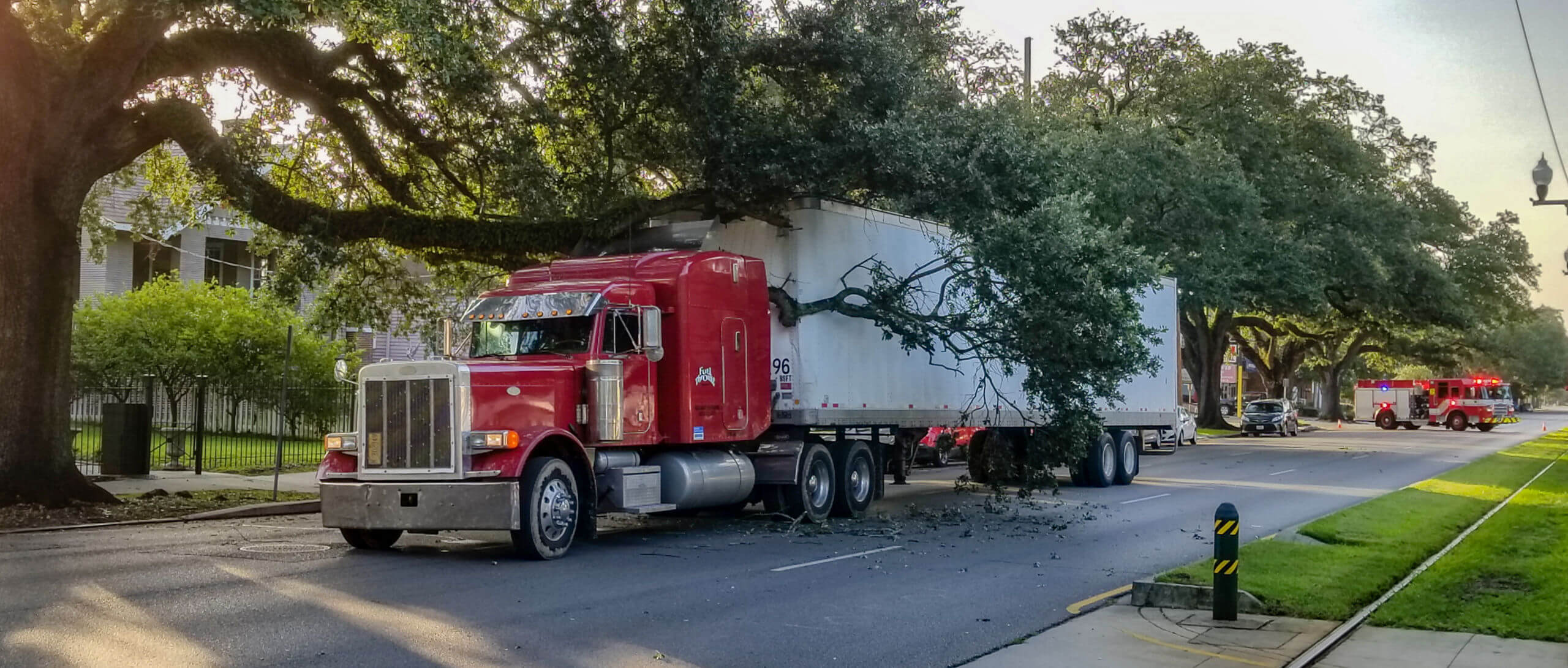 Two homes were damaged by a tractor trailer when it overturned near ...